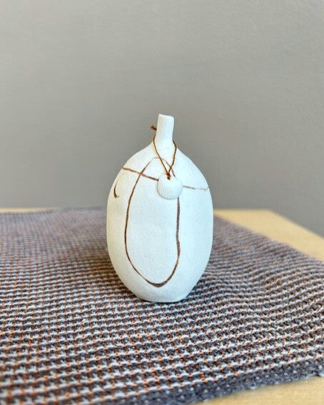 Porcelain rattling bottle by Kirsti Hannah Brown – Makers Guild in Wales